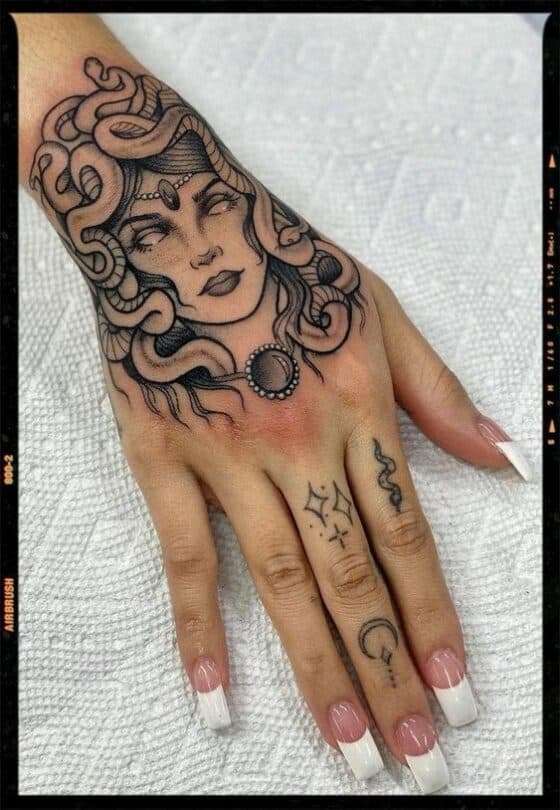 20 Powerful Hand Tattoos For Women • Body Artifact